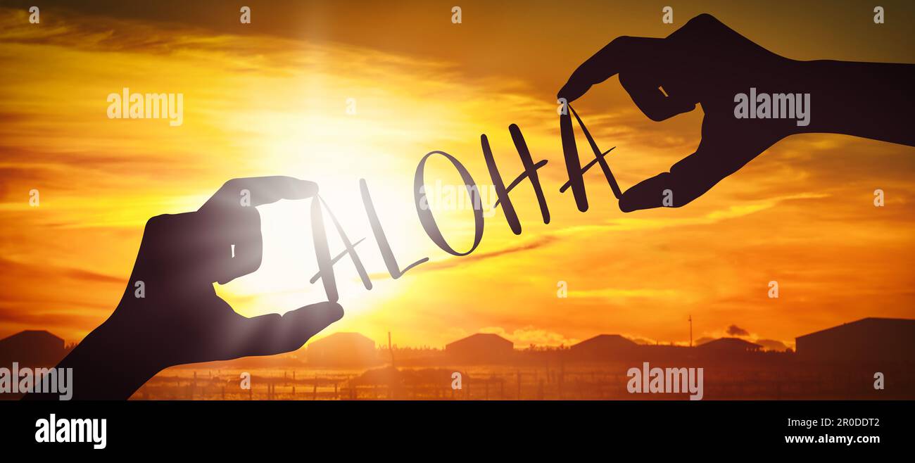 Aloha - human hands holding black silhouette word Stock Photo - Alamy