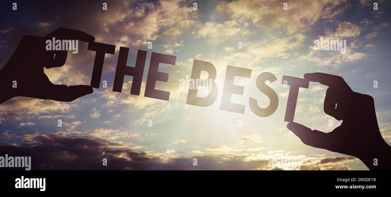 The best - human hands holding black silhouette word Stock Photo - Alamy