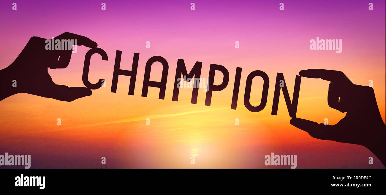Champion - human hands holding black silhouette word Stock Photo - Alamy
