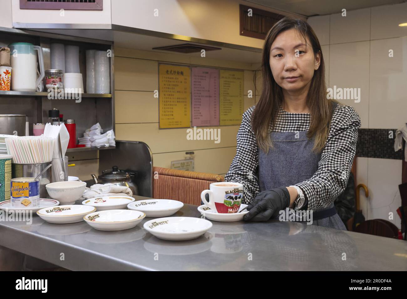 Natalie Or, Cafe manager of Sun Wah Cafe, poses for a picture at Sun ...