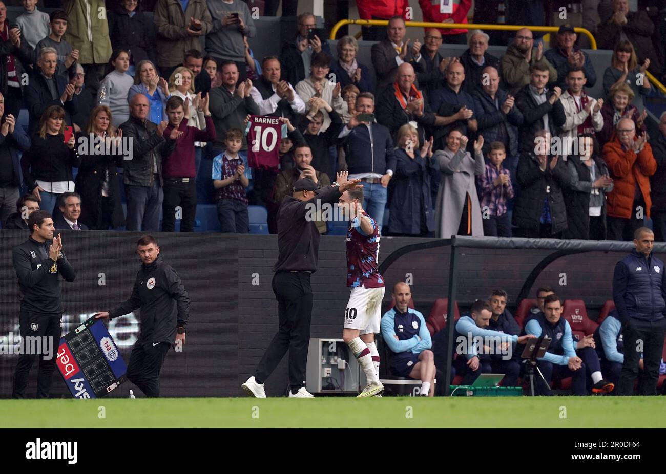 Burnley’s Ashley Barnes with manager Vincent Kompany as he is ...