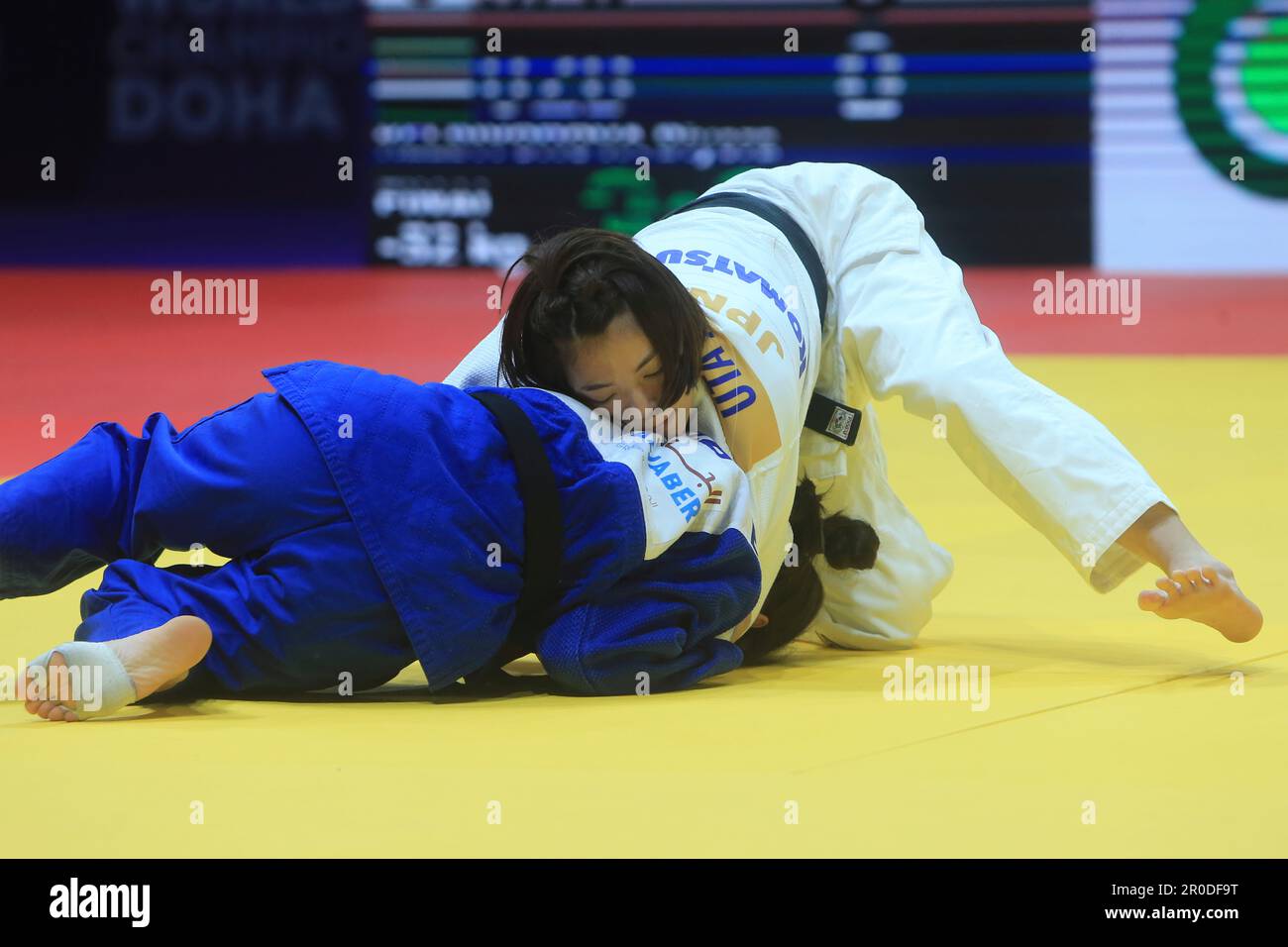 Uta Abe of Japan, right, and Diyora Keldiyorova of Uzbekistan compete during their women's -52kg ...