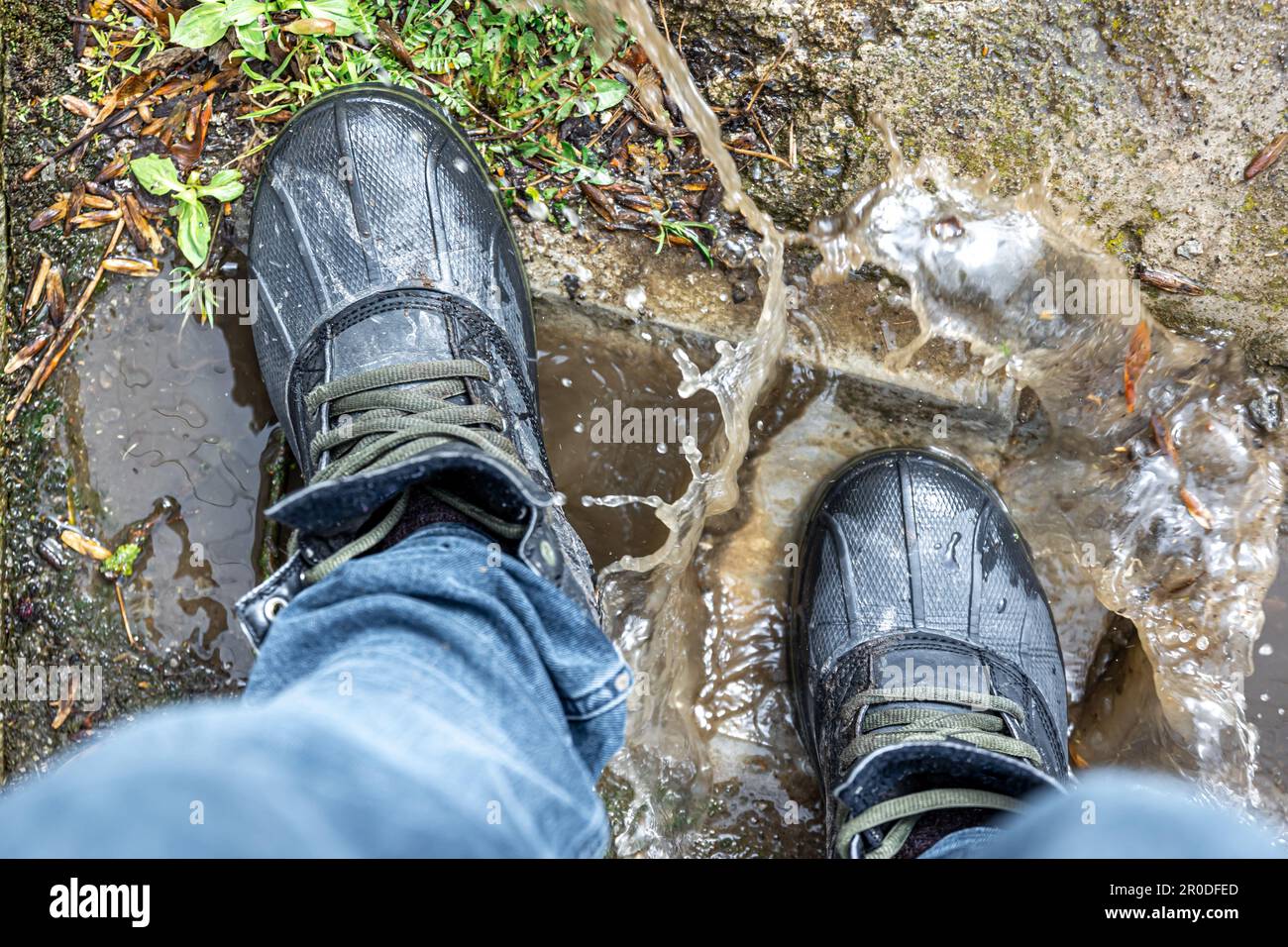 Pair of sneakers in mud hi-res stock photography and images - Alamy