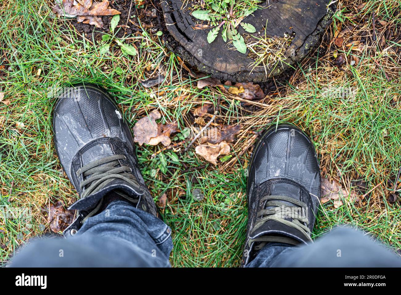 Pair of sneakers in mud hi-res stock photography and images - Alamy