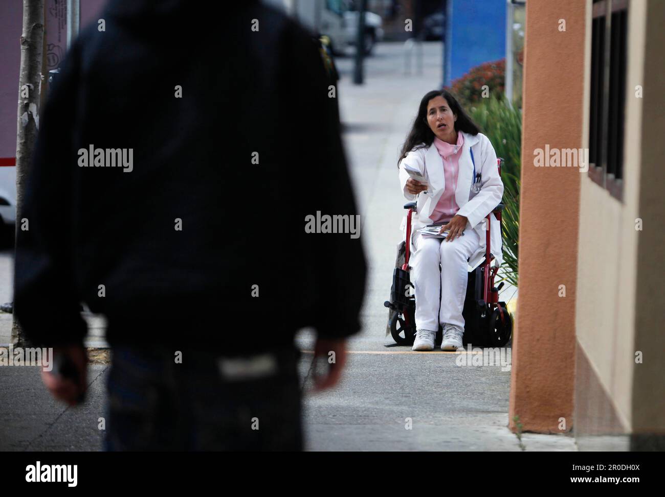 Ross Foti of Belmont demonstrates behind a line for a 25 foot buffer ...
