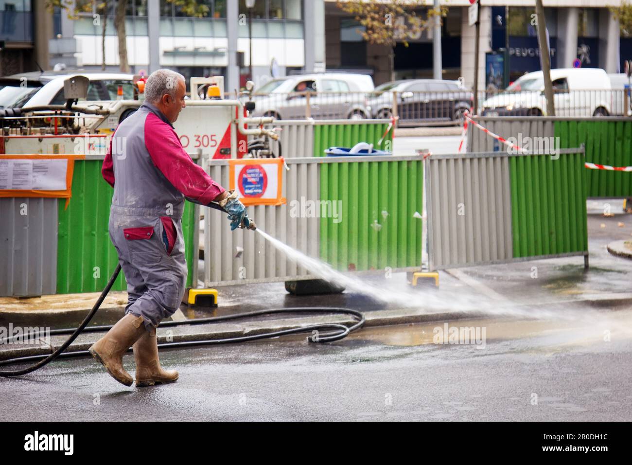 Paris, France - September 25, 2017: street cleaning by construction ...