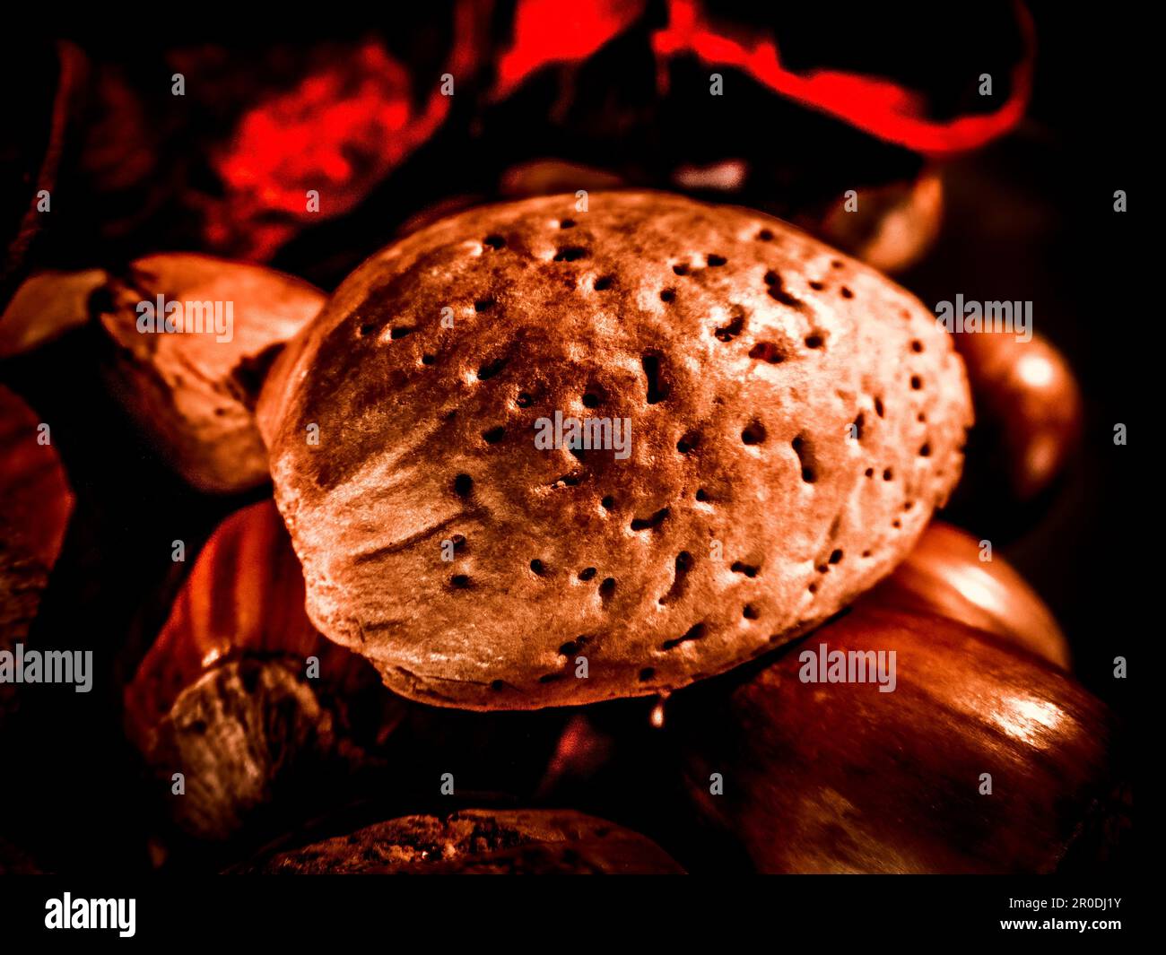 A glass bowl filled with assorted Christmas nuts Stock Photo - Alamy