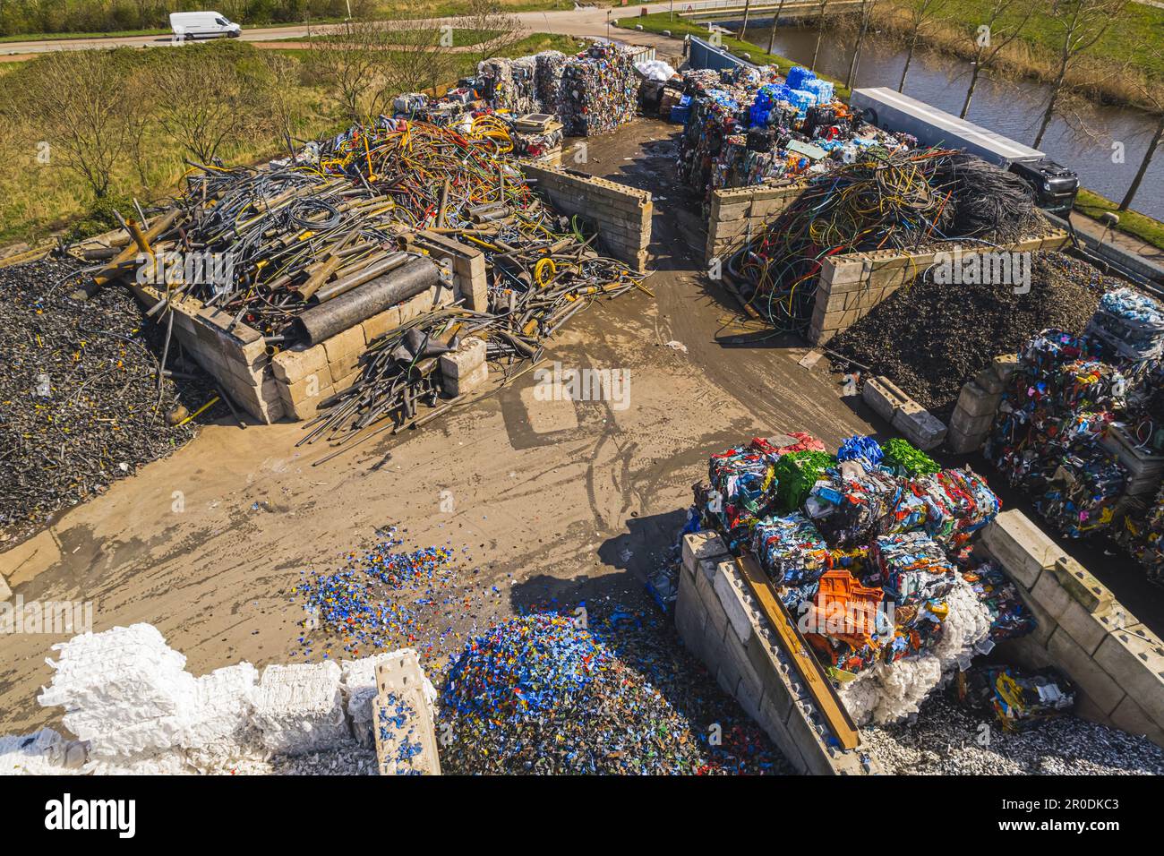 Massive piles of scrap metal or plastic at the recycling plant . High ...
