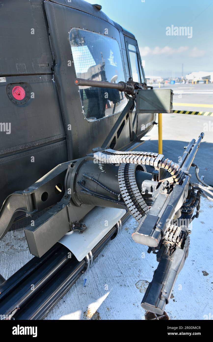 A military-style armored jet with a large machine gun mounted on the ...