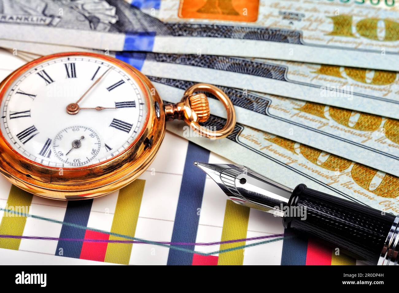 pocket watch, fountain pen and dollars, close up Stock Photo - Alamy