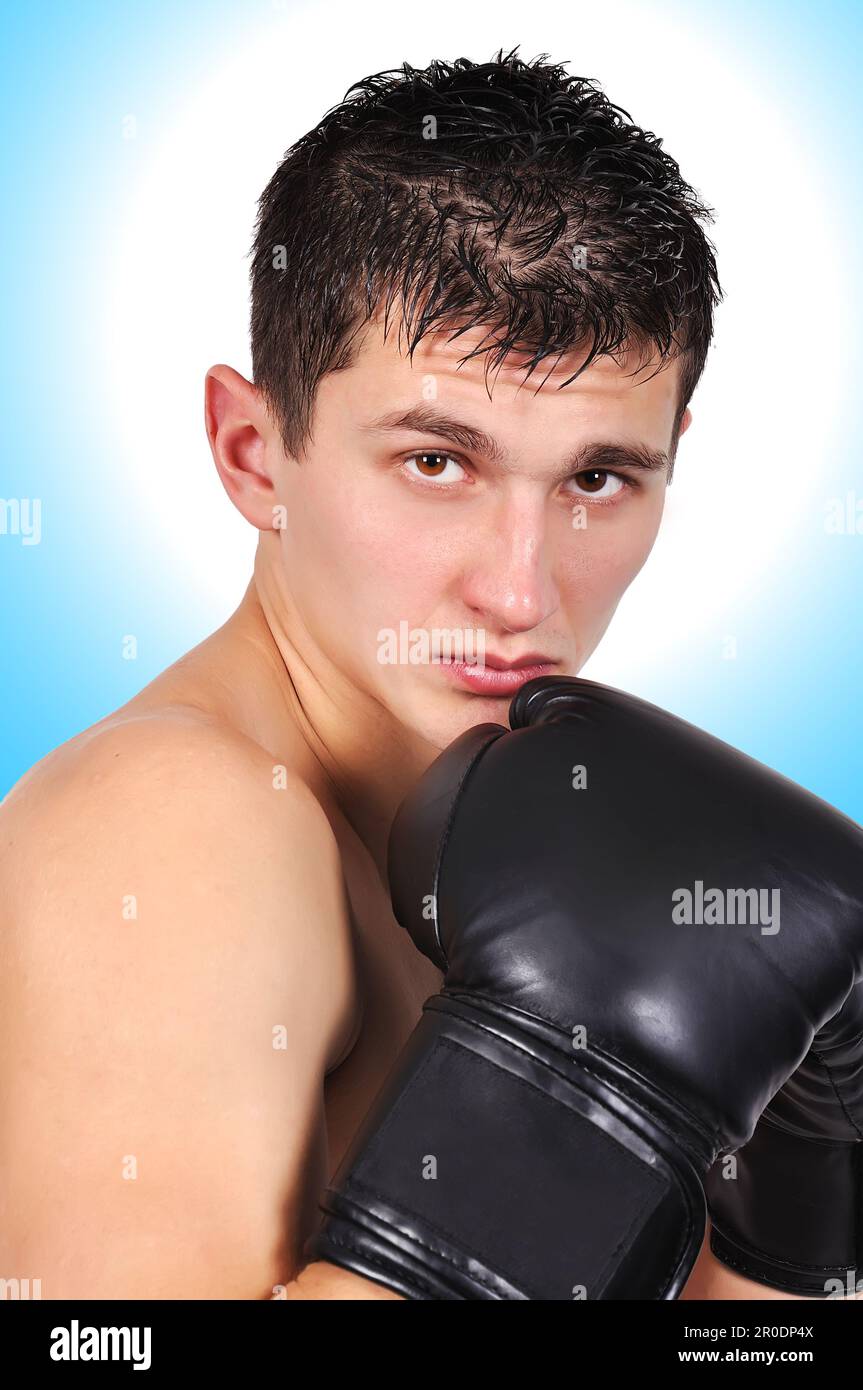 portrait muscular man wearing boxing black gloves Stock Photo - Alamy