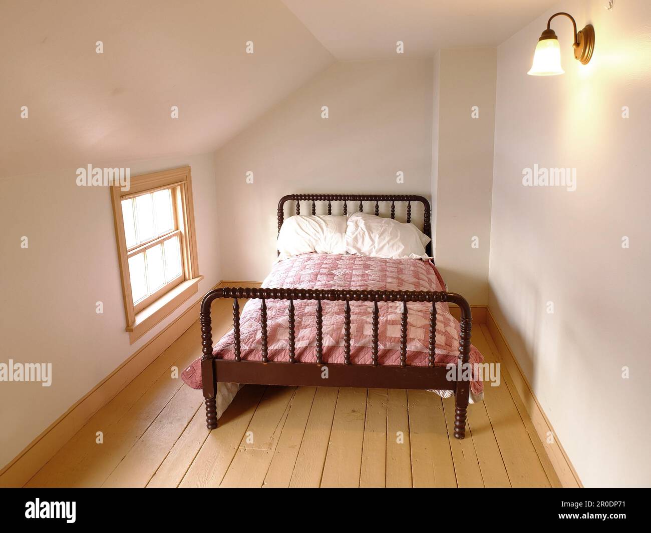 Old fashioned antique bedroom with bed headboard chair and window Stock ...