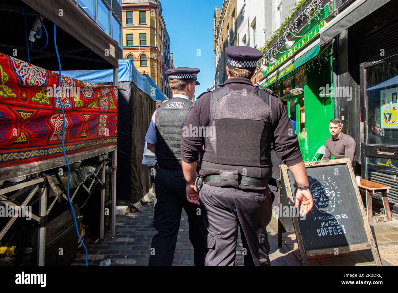Policemen on patrol in Soho, London Stock Photo - Alamy