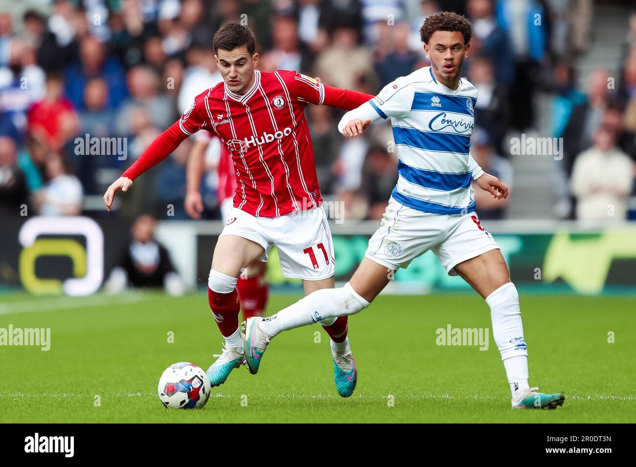 Bristol City's Anis Mehmeti (left) and Queens Park Rangers' Luke Amos ...