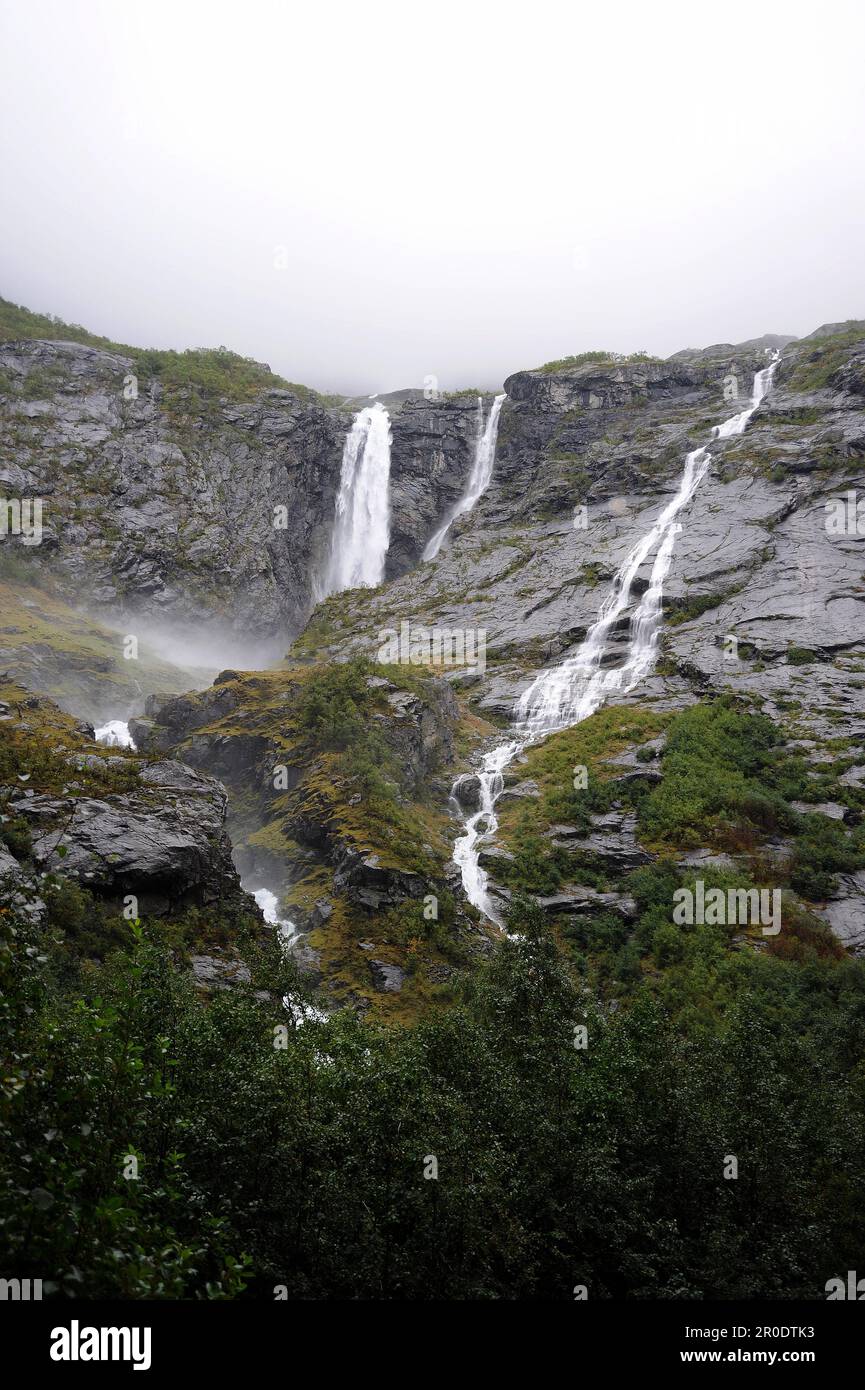 The 400 feet sheer drop of Krunefossen - a waterfall with a total ...