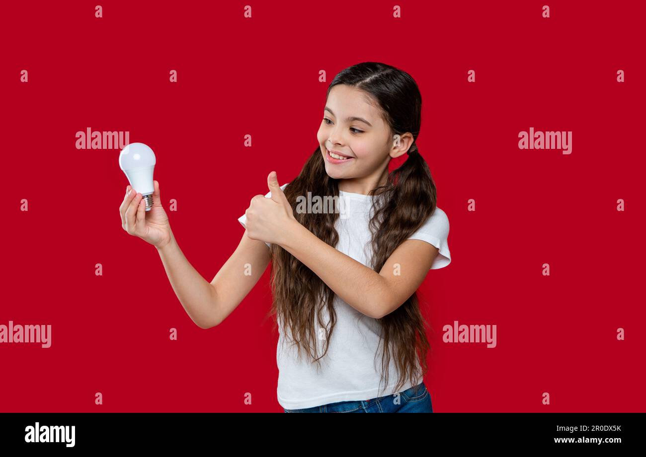 teen innovation girl in studio, thumb up. teen innovation girl on ...