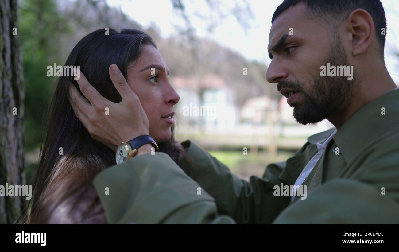 An Arab boyfriend consoling grieving girlfriend going through difficult ...