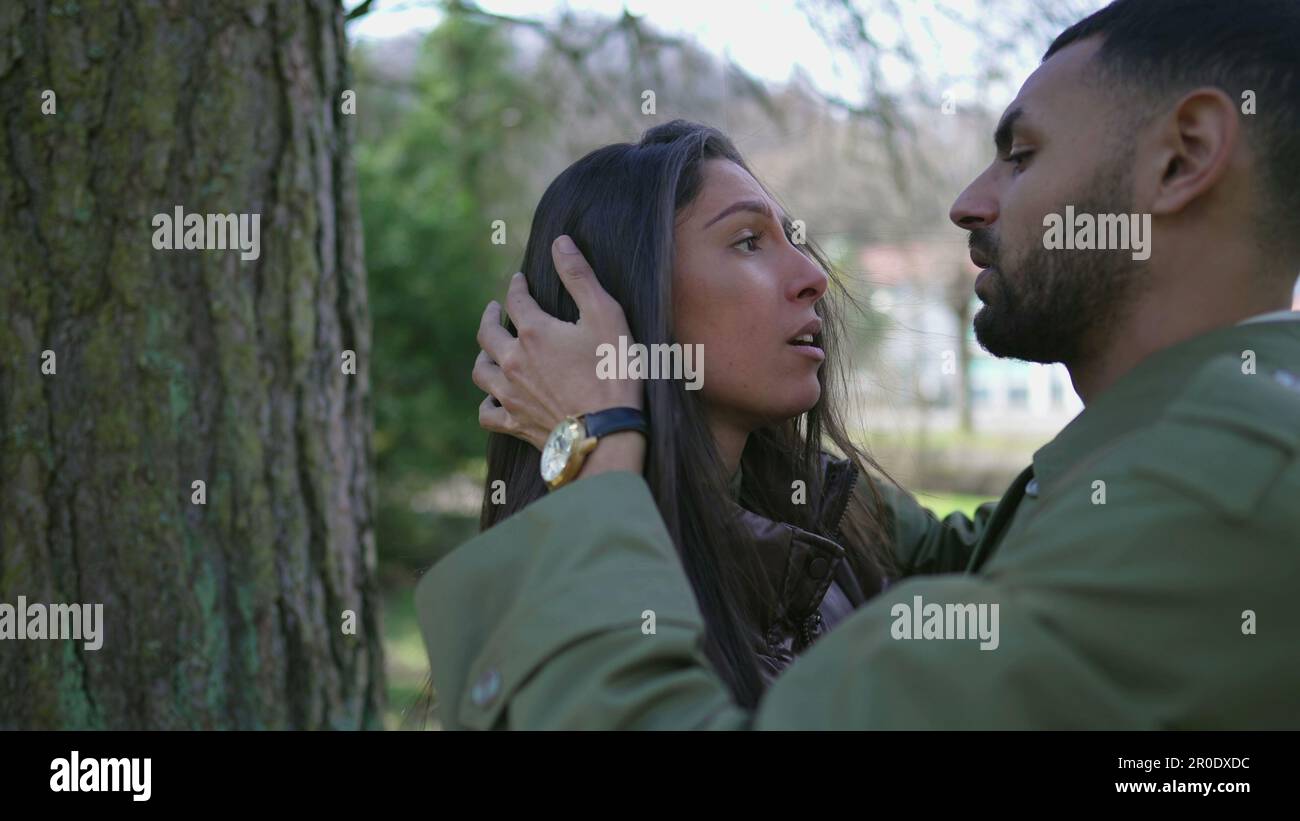 An Arab boyfriend consoling grieving girlfriend going through difficult ...