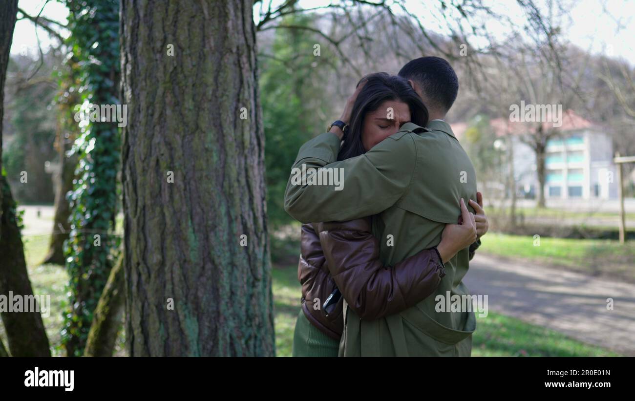 Compassionate embrace between a suffering couple. Empathic moment ...