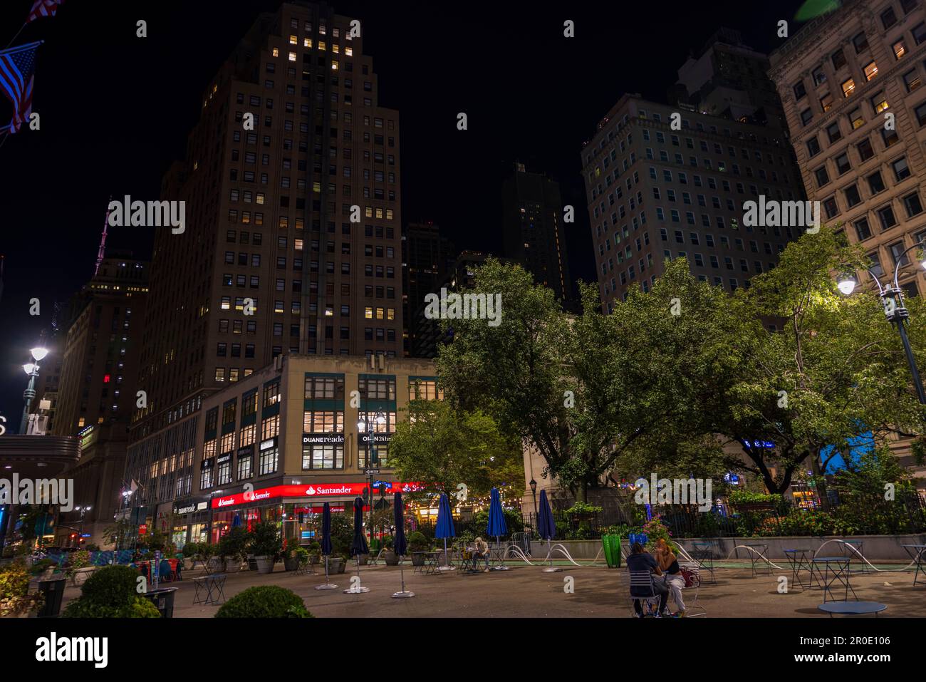 Beautiful view of night New York city landscape. Empty park square with ...