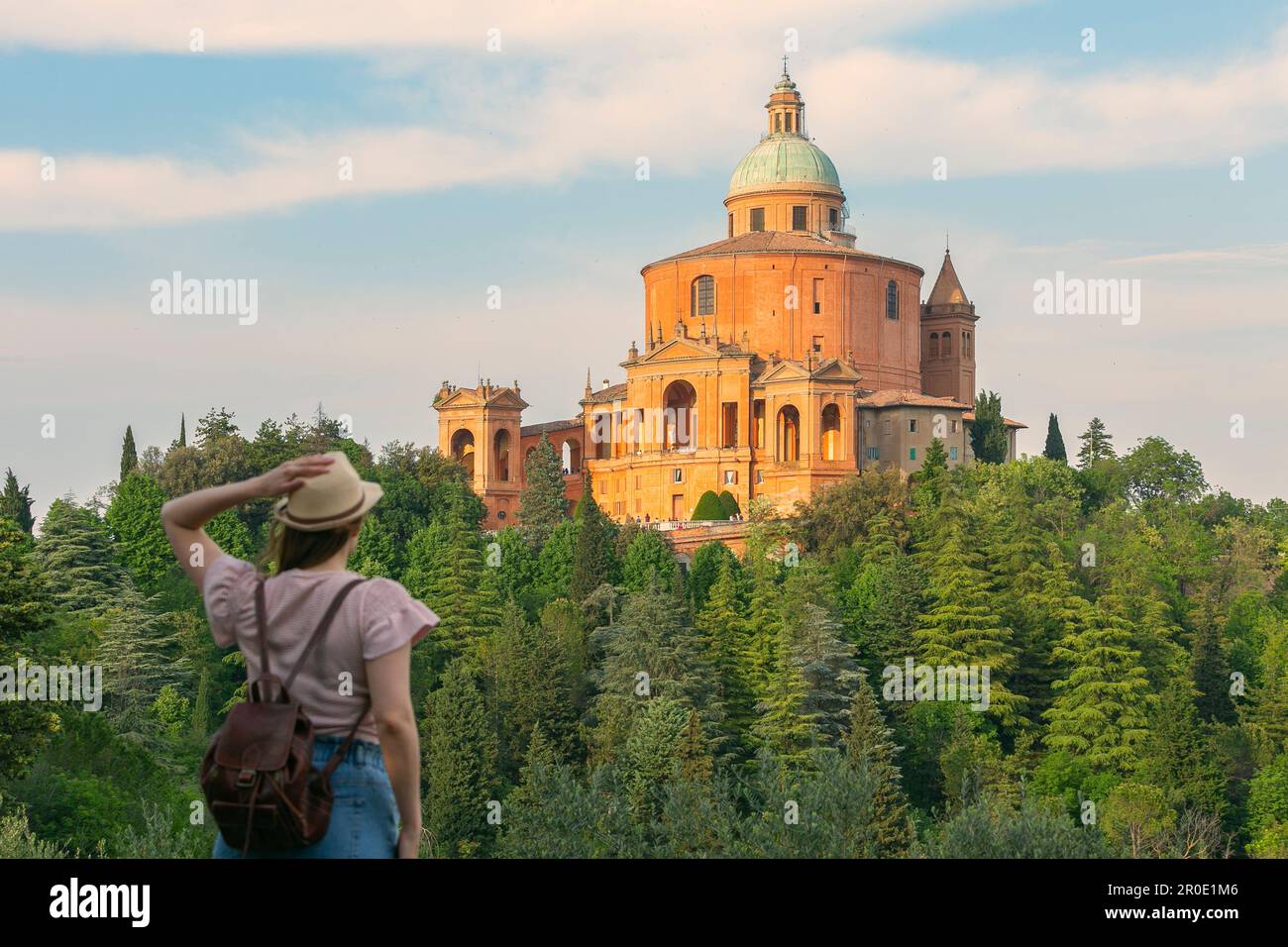 Bologna, San Luca - young girl with hat standing looking the Sanctuary ...
