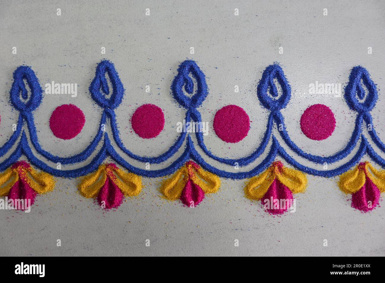 Beautiful multicolored Rangoli design. Border rangolis handmade sand ...