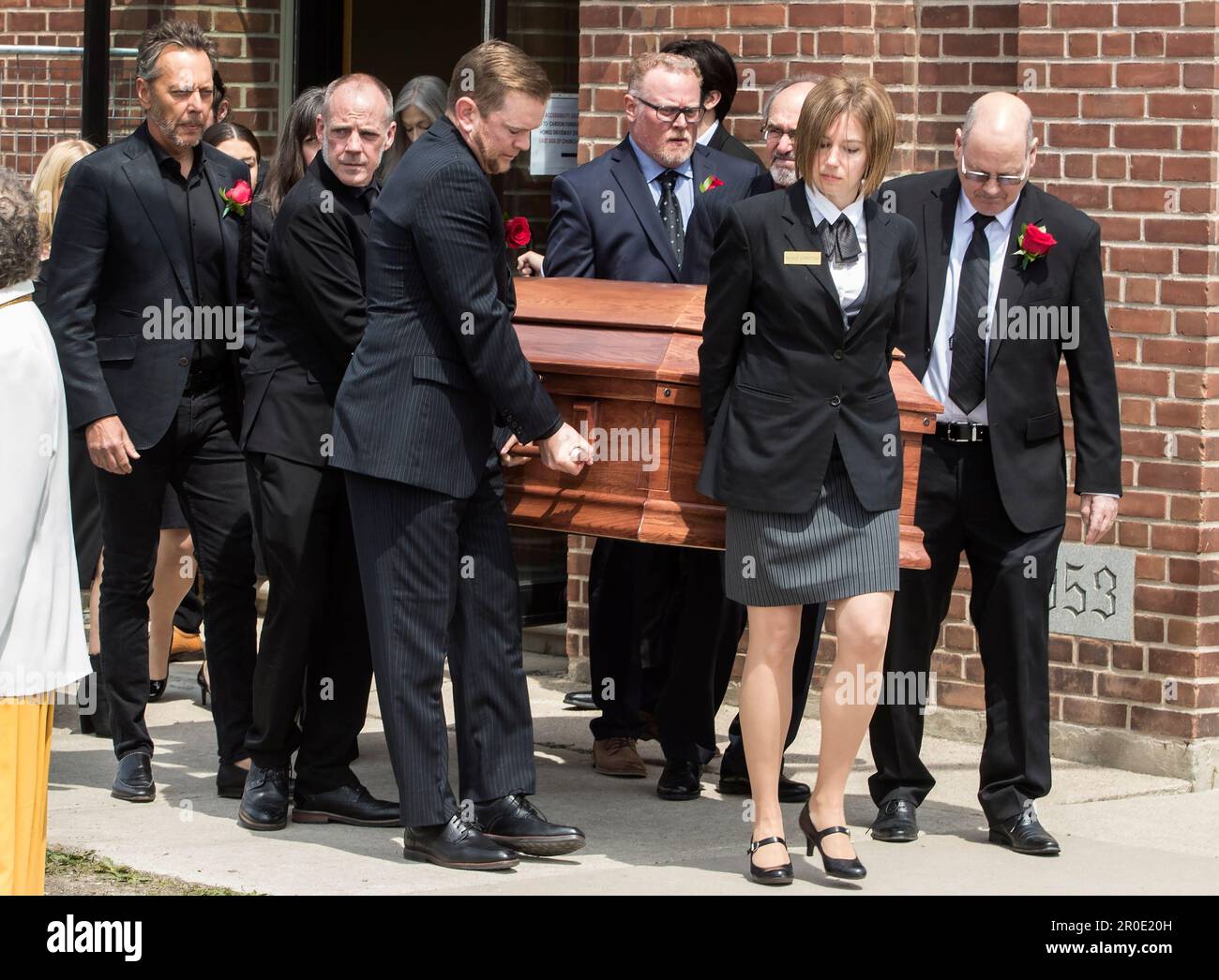 Family members carry the casket of singer-songwriter Gordon Lightfoot after a funeral service at ...