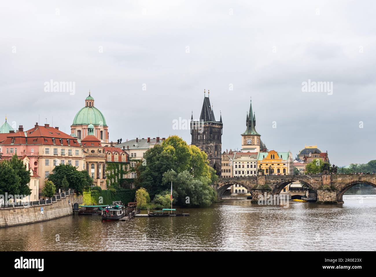 Wide-angle view of the Vltava river and Charles bridge in Prague on a ...