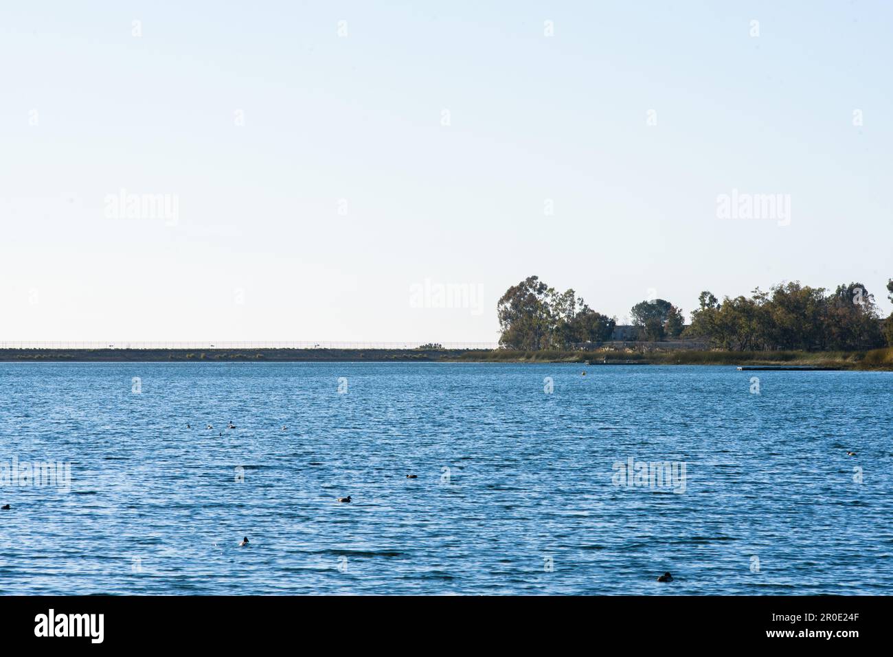 A picturesque landscape featuring Lake Miramar in San Diego, California ...