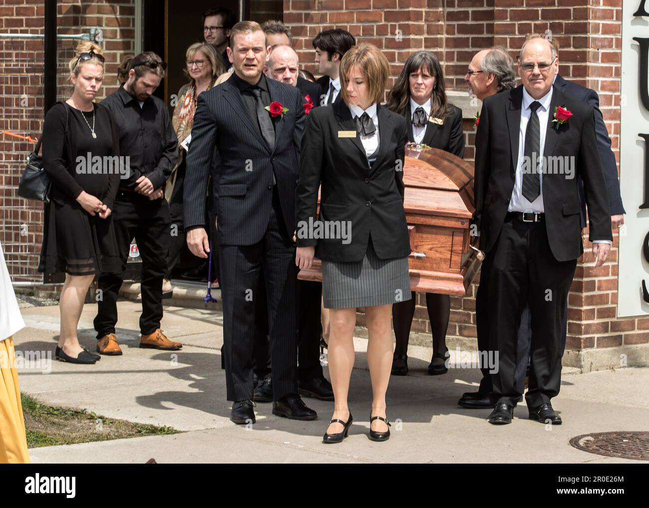 Family members carry the casket of singer-songwriter Gordon Lightfoot after a funeral service at ...
