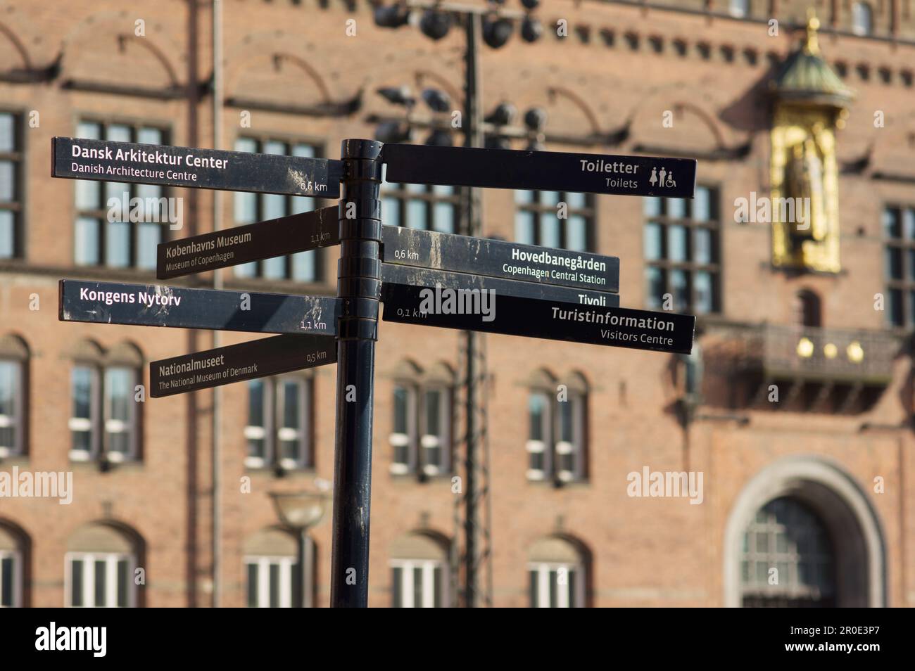 Pole with a blue signpost in the center of Copenhagen in Denmark Stock ...