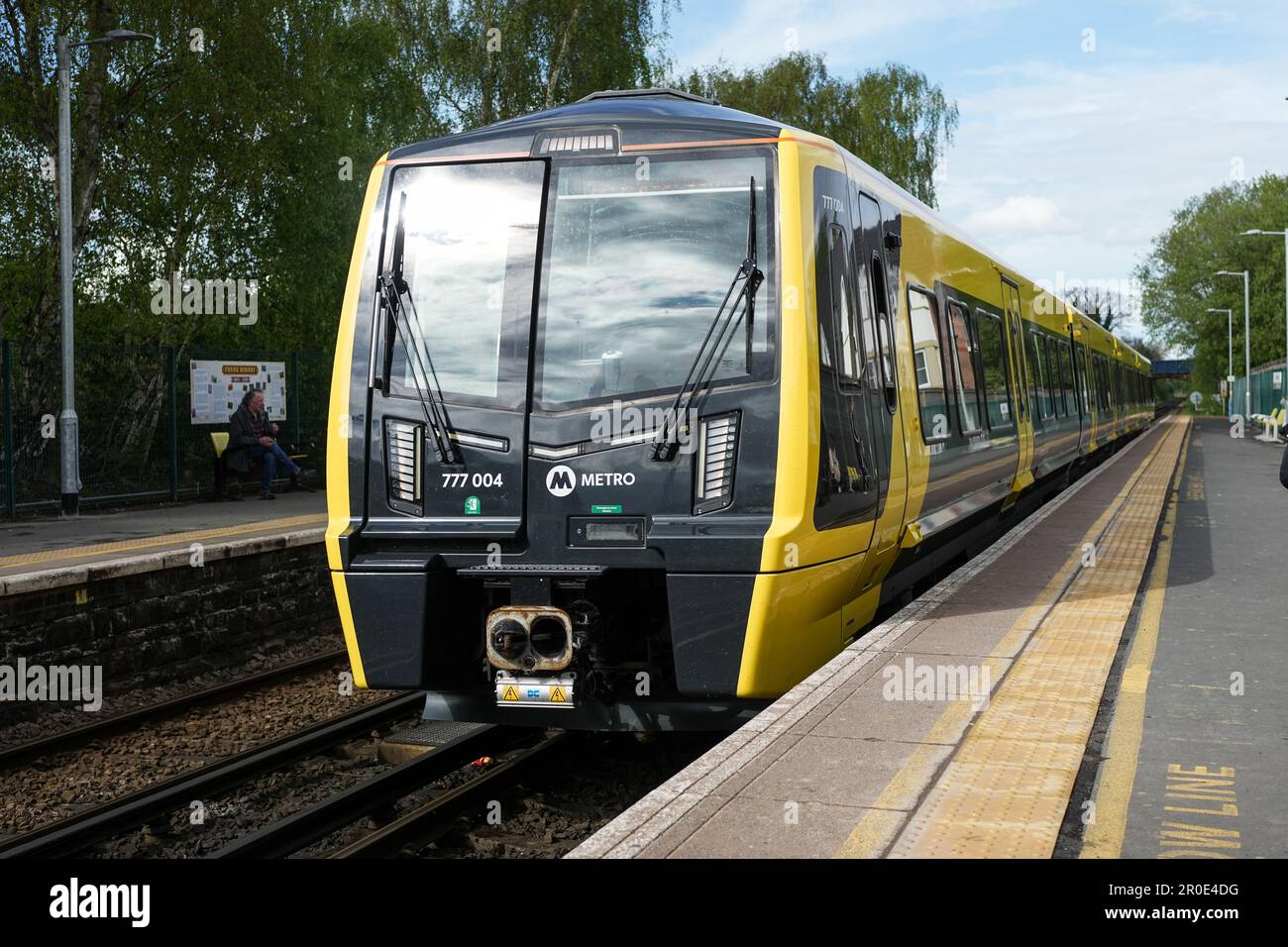 A new train Class 777 for Merseyrail service arrives at Maghull Station ...
