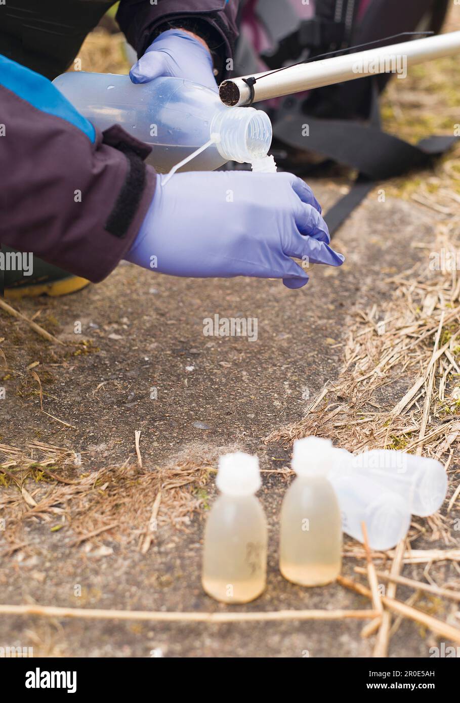 Postgraduate students conducting research: Taking water samples ...