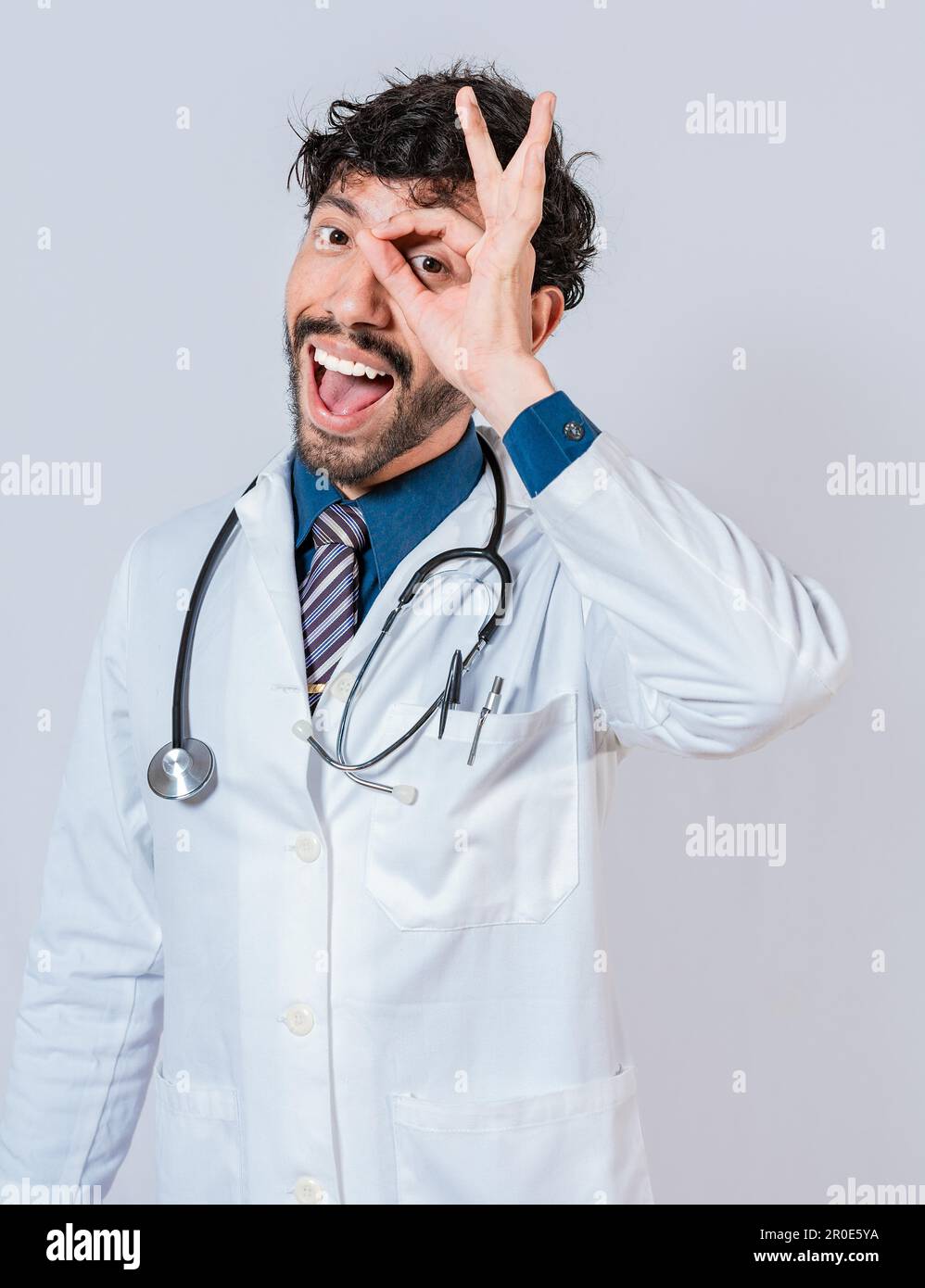 Happy doctor gesturing approval isolated, Latin doctor approving on ...