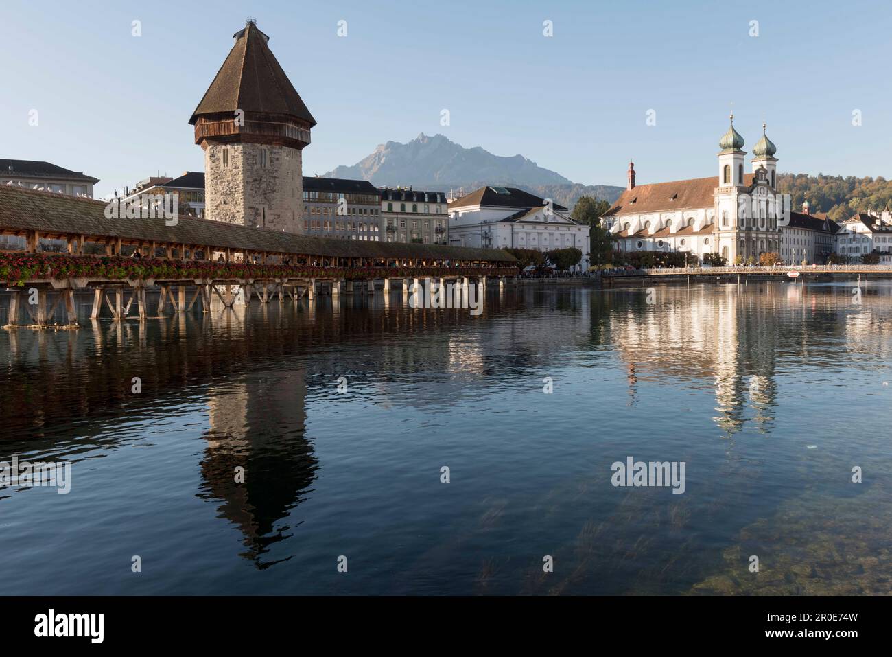 The Kapellbrücke (Chapel Bridge) over the River Reuss, the water tower ...