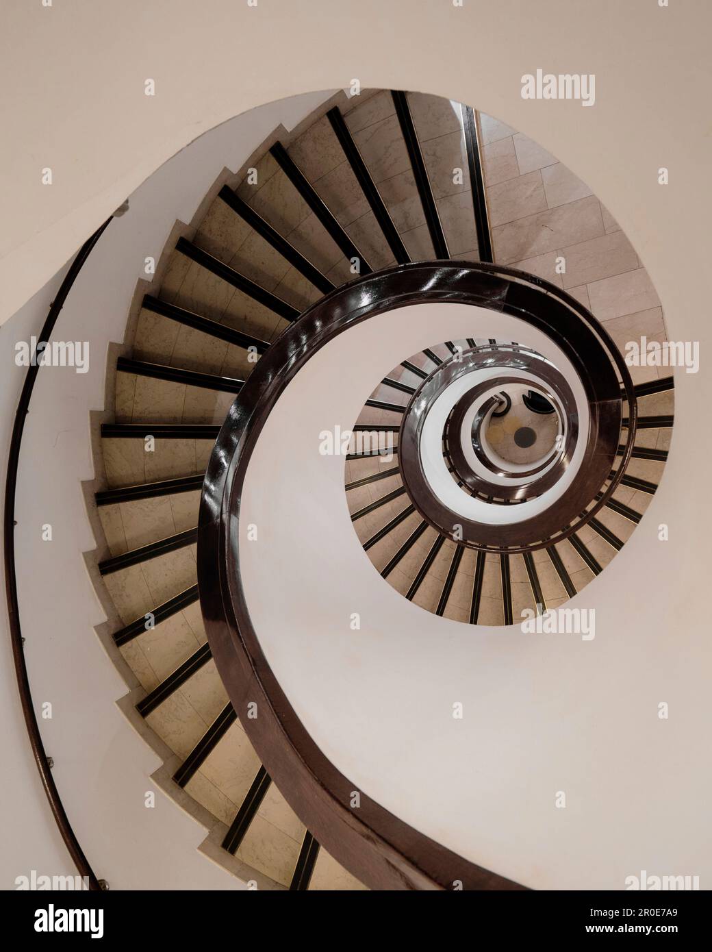 A spiral staircase in the Stockman department store, Helsinki, Finland ...