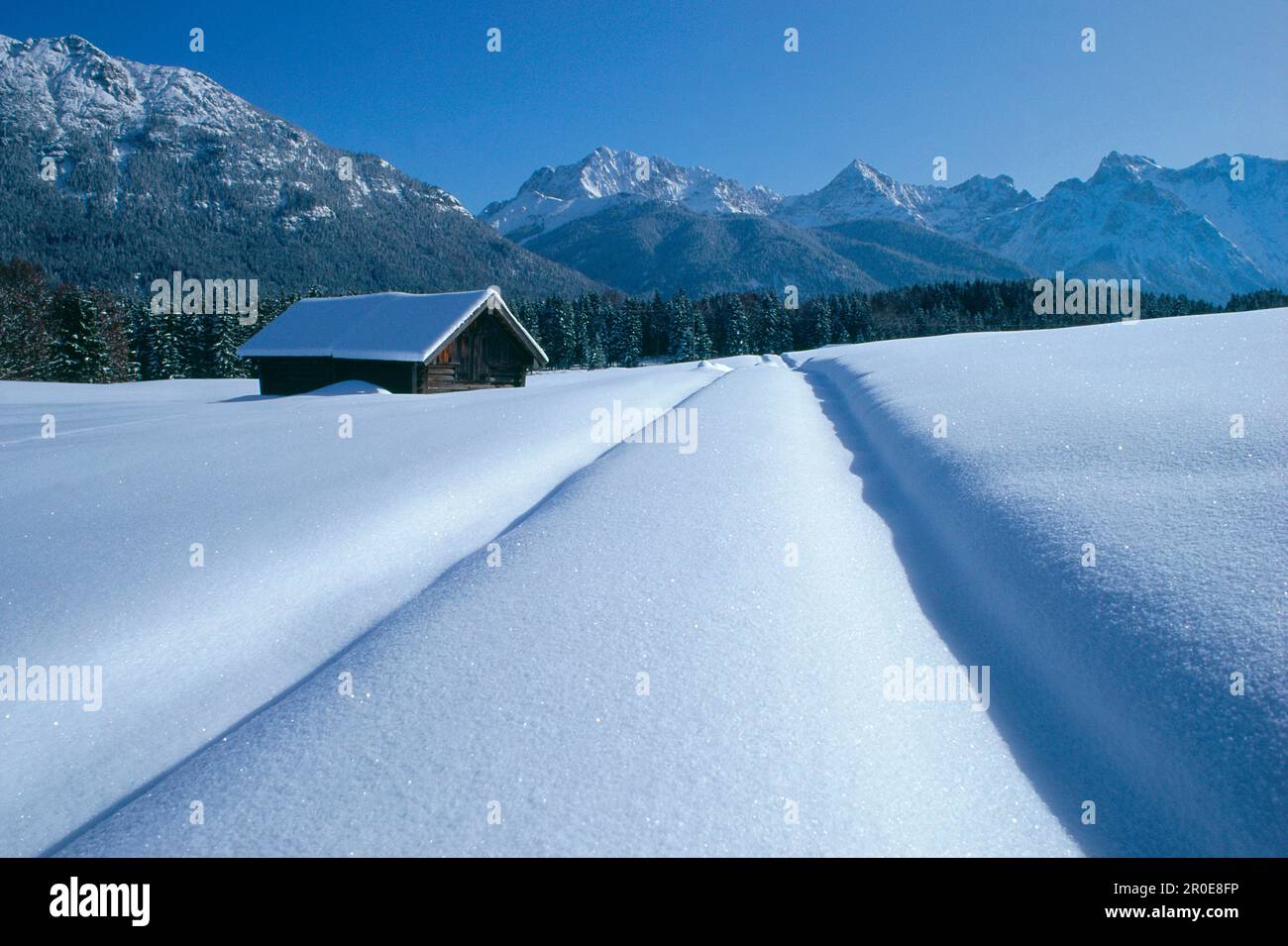 Woddem hut in winter scenery, Upper Bavaria, Germany Stock Photo - Alamy