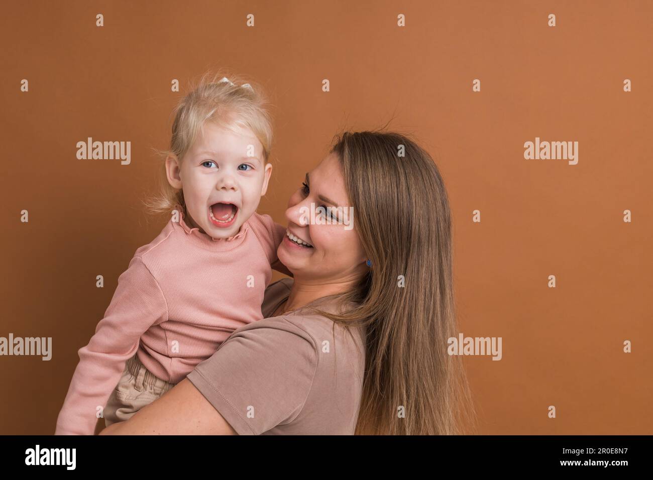 Deaf child girl with cochlear implant studying to hear sounds and have ...