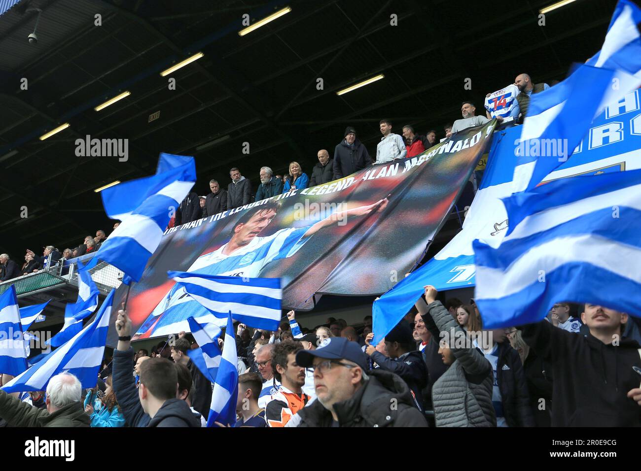 London, UK. 08th May, 2023. Queens Park Rangers fans wave flags in ...