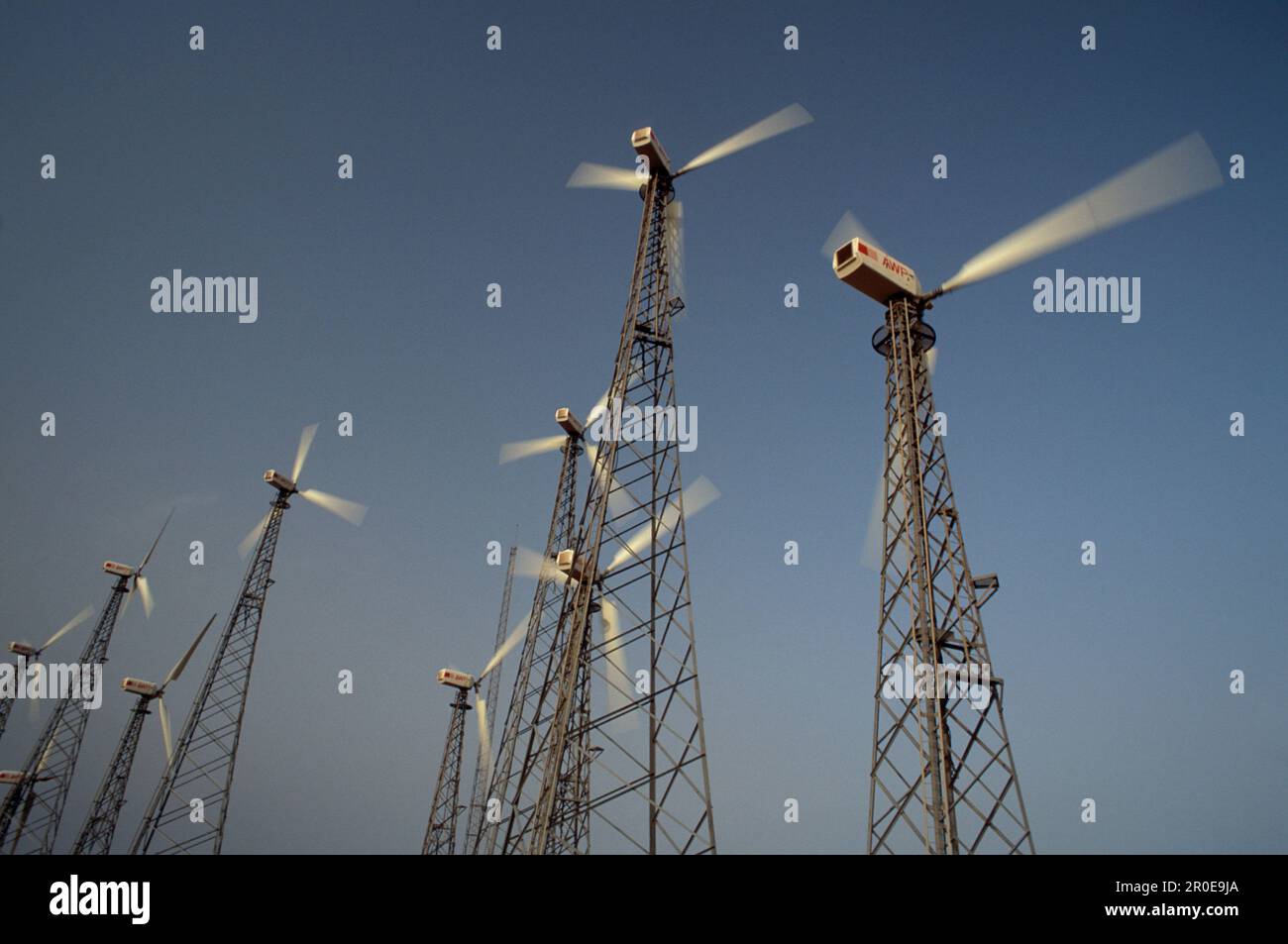 Windwheels in front of a clear sky Stock Photo - Alamy