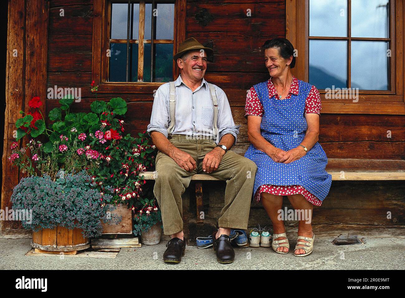 Local married couple before their farmhouse, Bavaria, Germany Stock ...