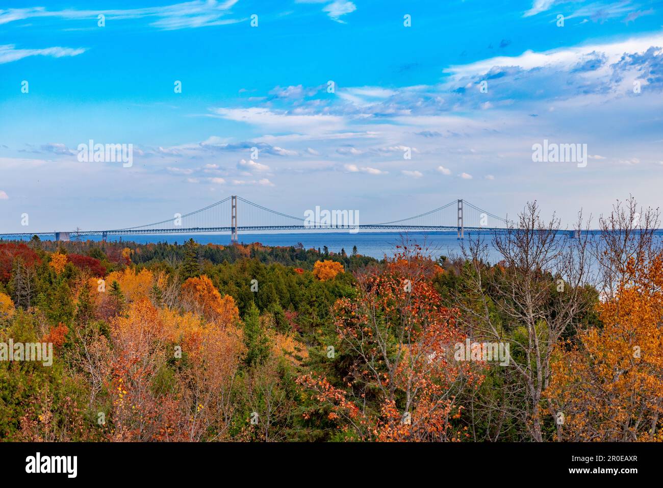 An aerial view of the Mackinac Bridge in Michigan, surrounded by ...