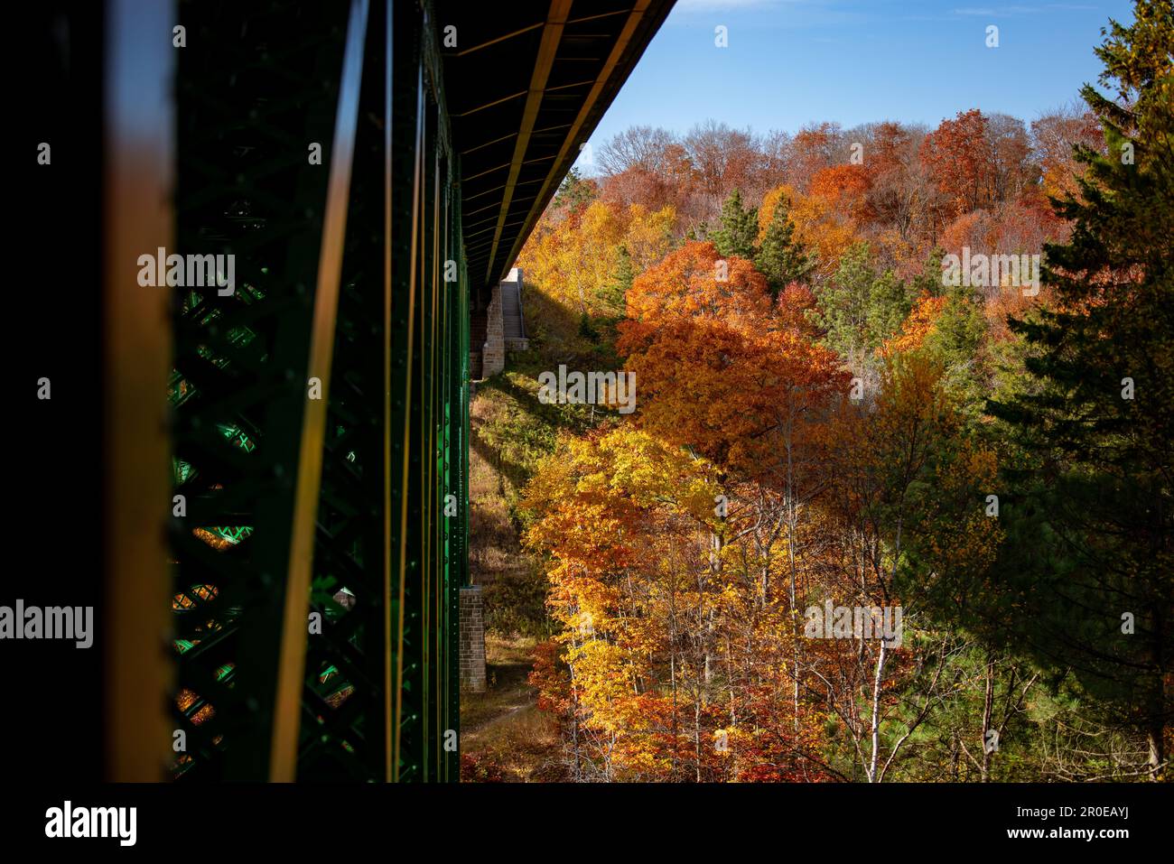 The Cut River Bridge in Michigan, surrounded by vibrant fall colors of ...