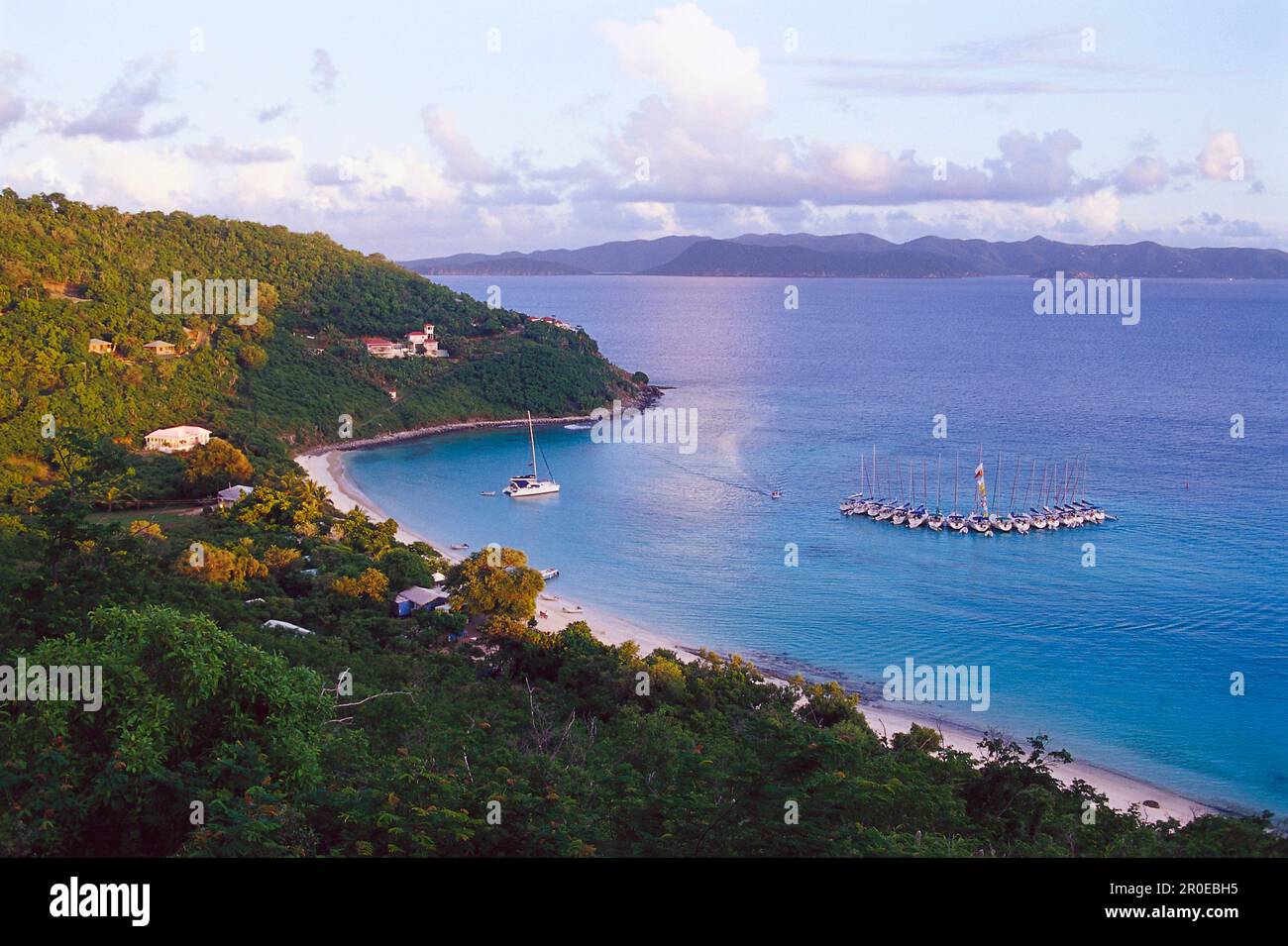Boats in a bay under clouded sky, White Bay, Jost van Dyke, British ...