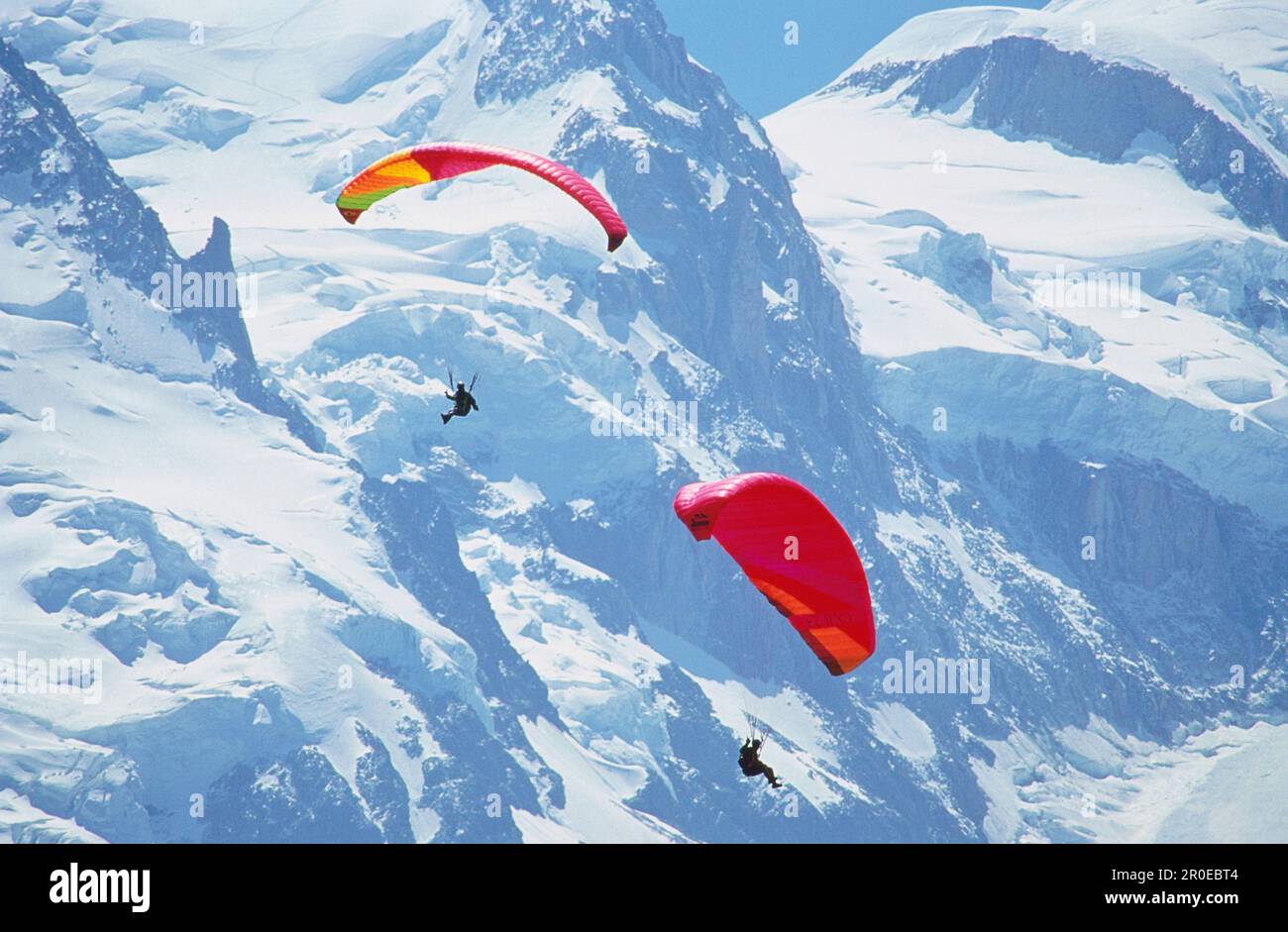 Two people paragliding at the mount Montblanc, Chamonix, France, Europe ...