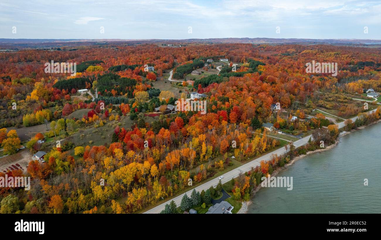An aerial view of an autumnal scene of trees on the banks of a Cut ...