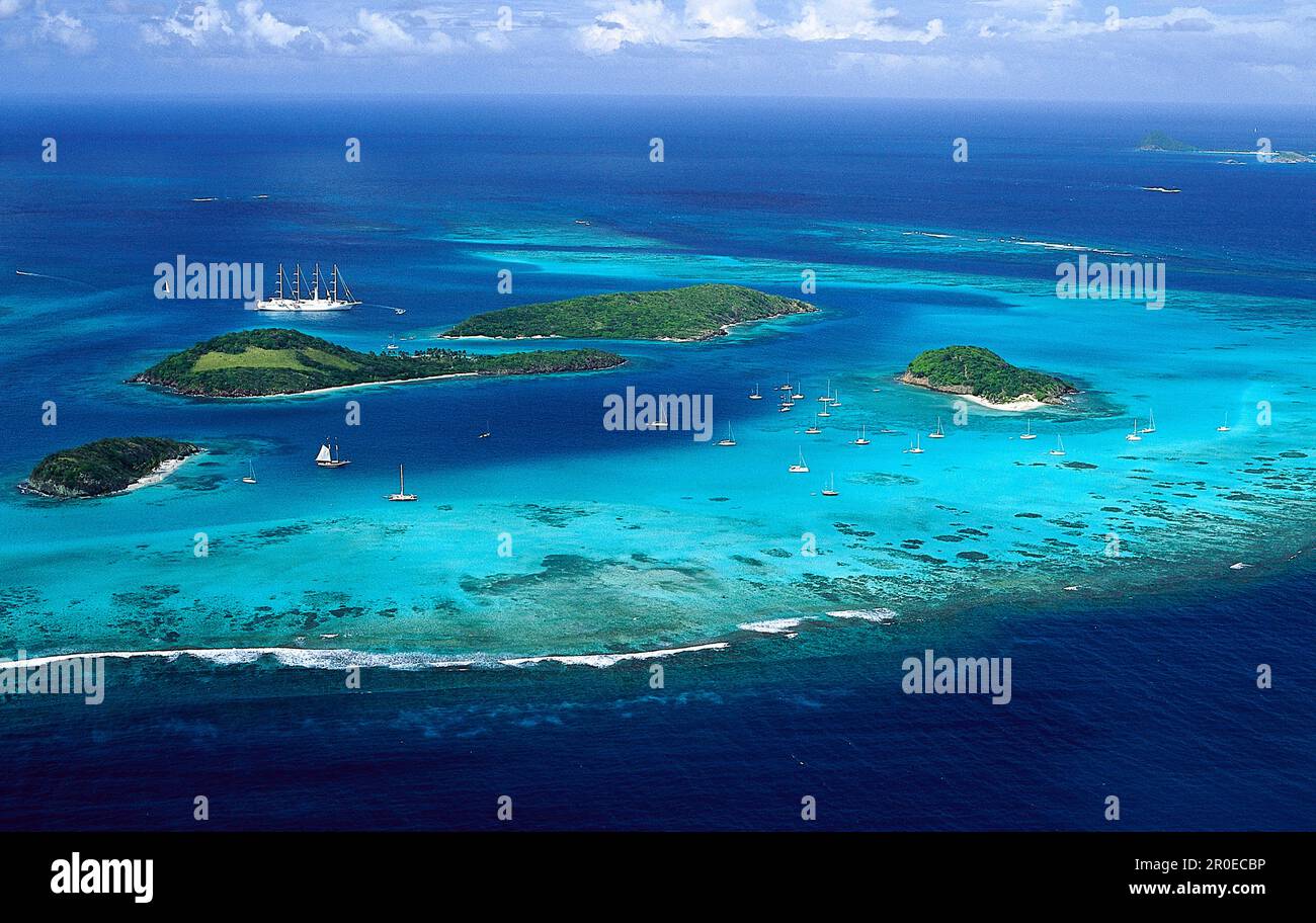 Aerial view of the archipelago Tobago Cays under clouded sky ...