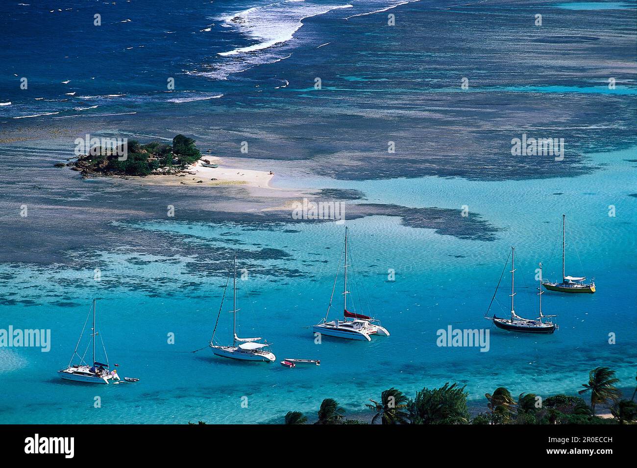 Aerial view of sailing boats off an uninhabited island, St. Vincent ...