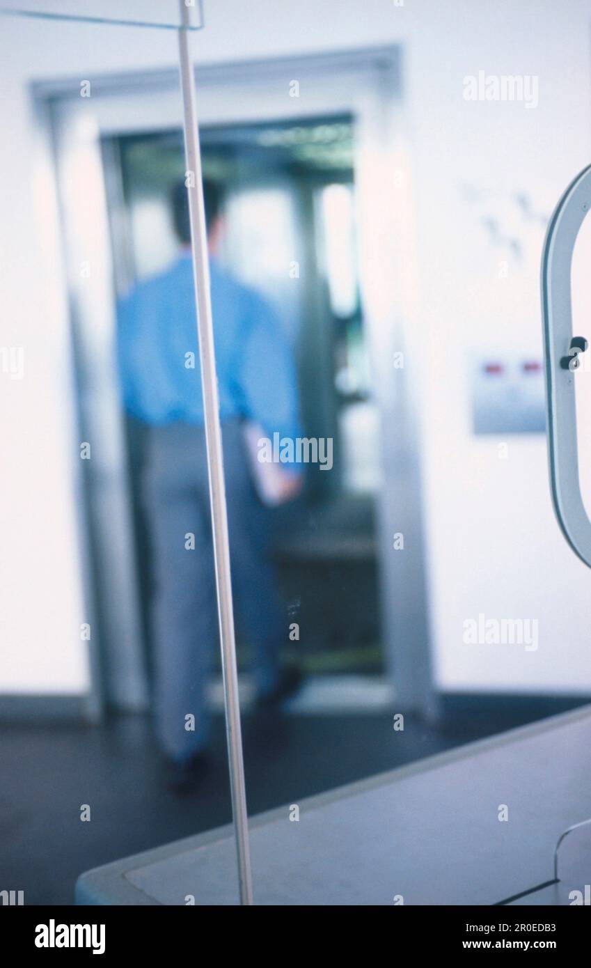 View through a counter window of an agency Stock Photo - Alamy