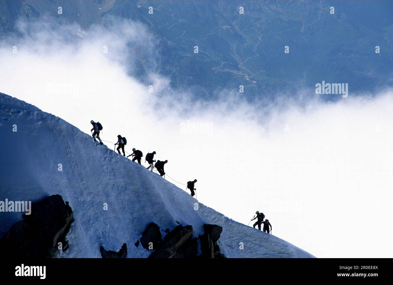 Alpinists ascending and descending Aiguille du Midi, Alps, France Stock ...